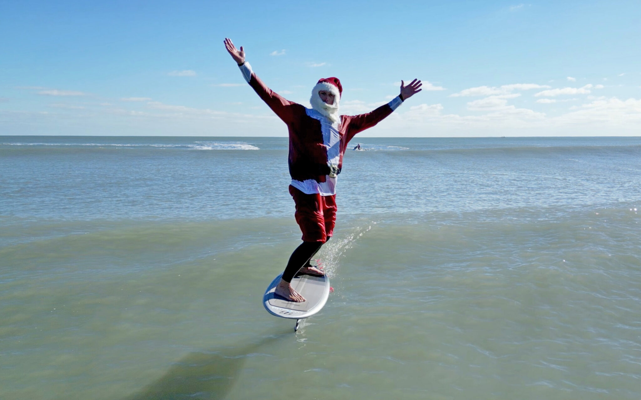 Experience Surfing Santas 2025 - Visit Space Coast